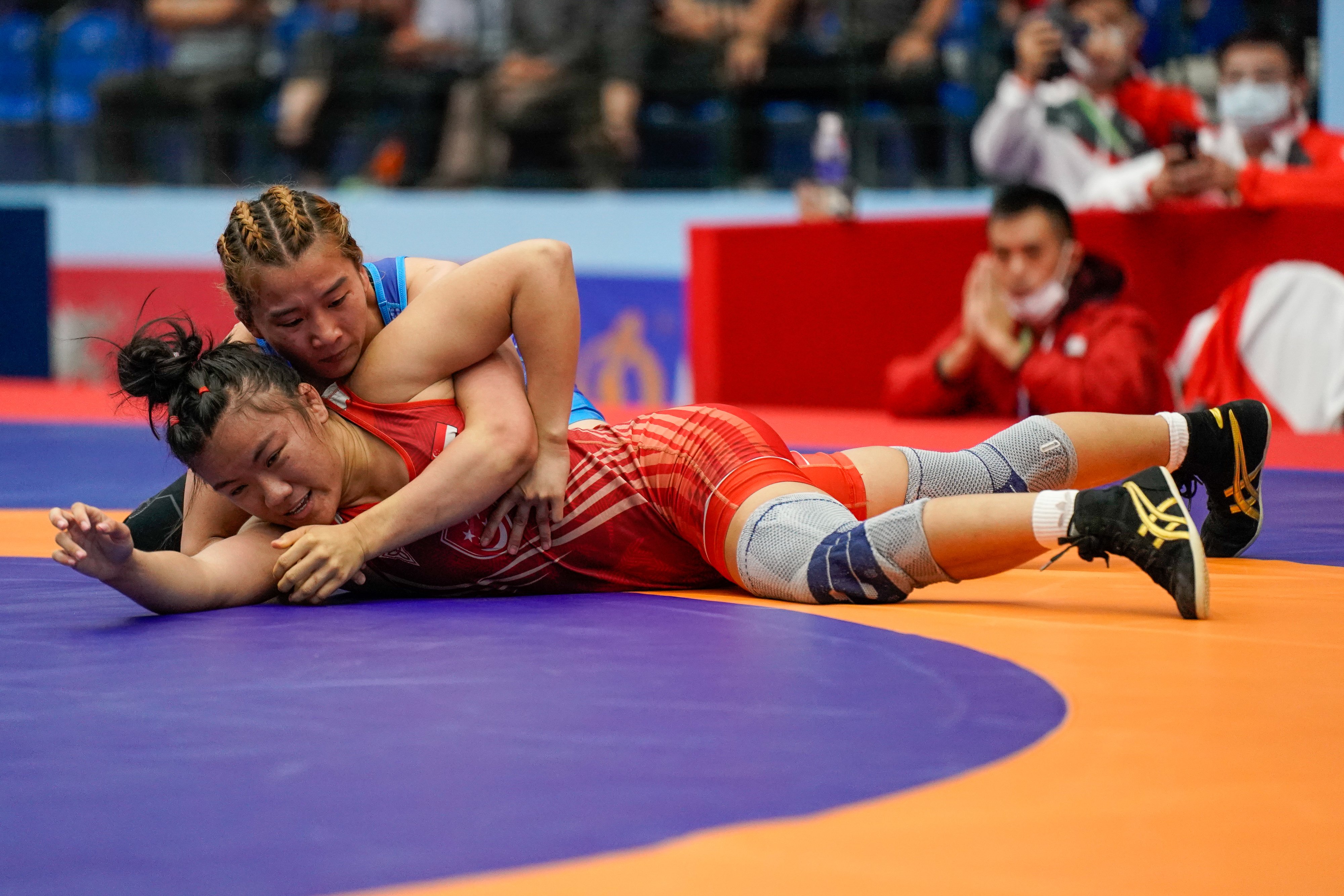 TeamSG Wrestler Danielle Lim misses out on medal, despite gutsy ...