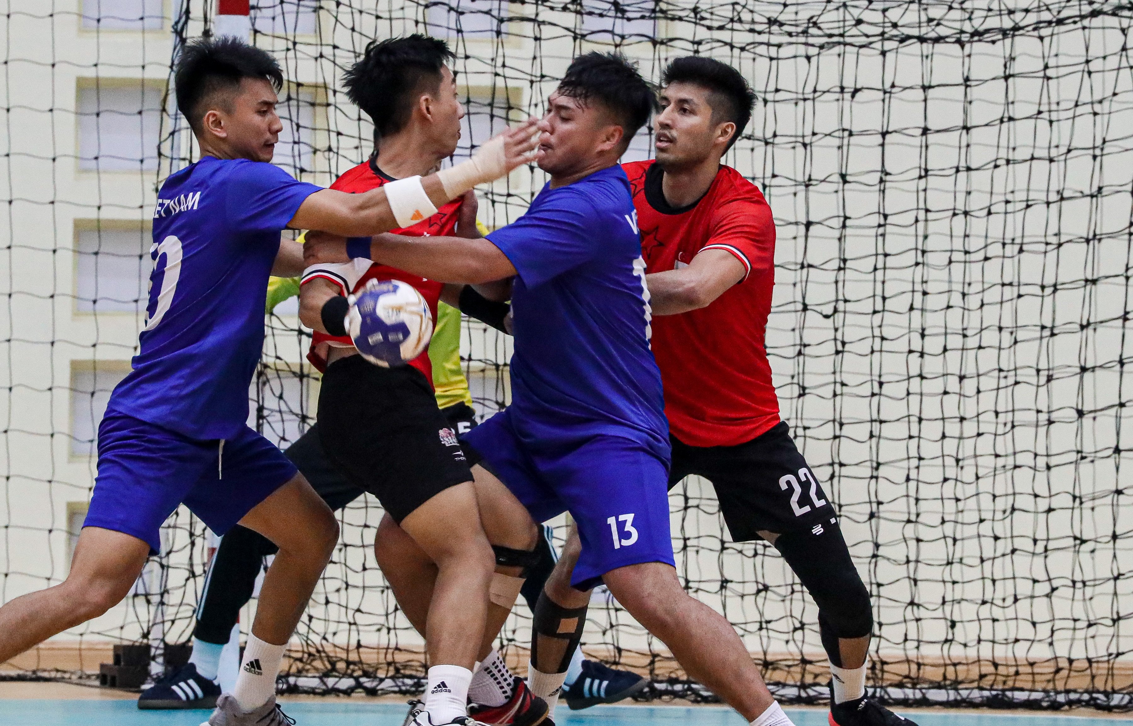TeamSG's indoor handball teams miss out on medal chance at SEA Games debut!