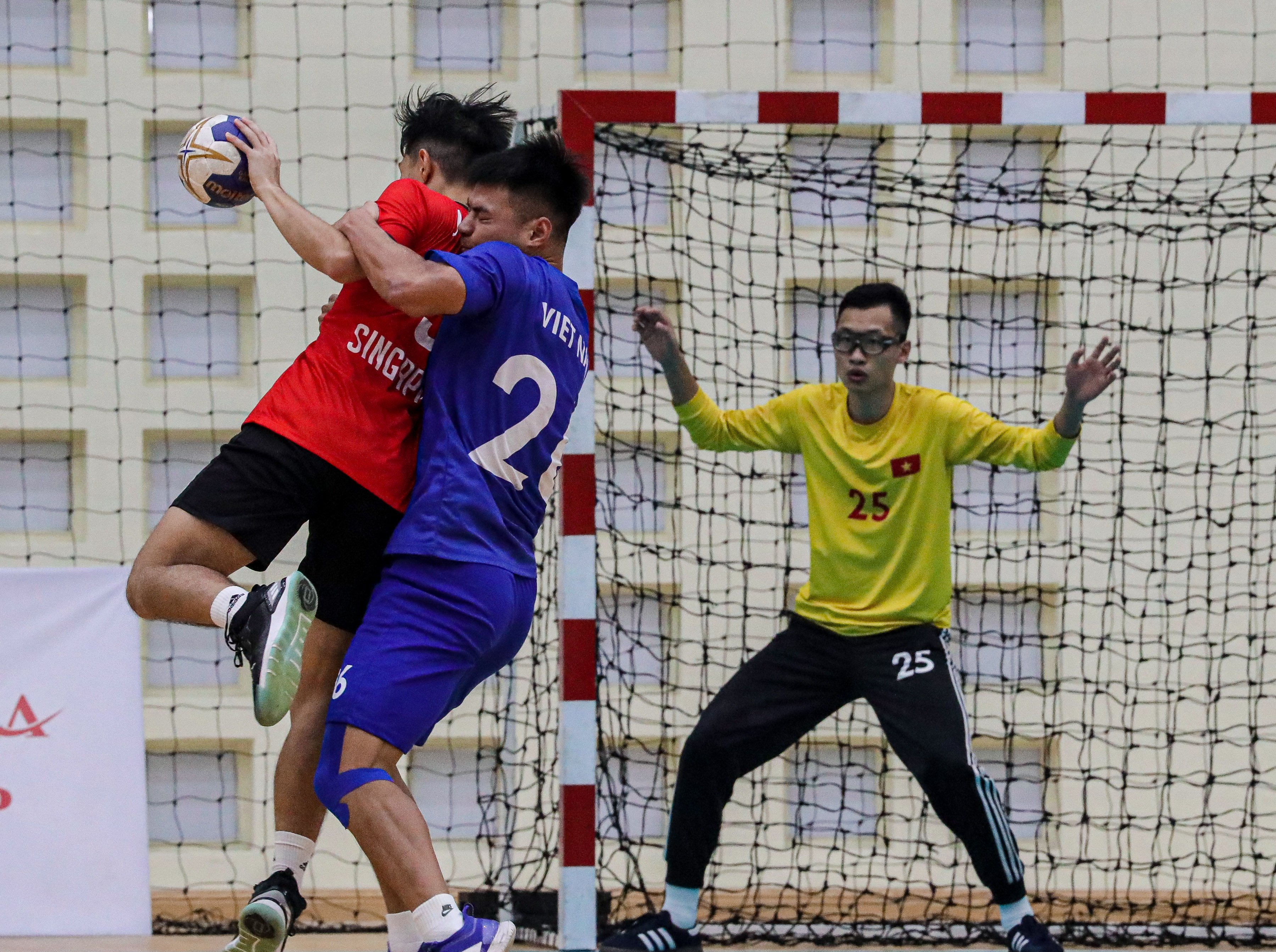TeamSG's indoor handball teams miss out on medal chance at SEA Games debut!